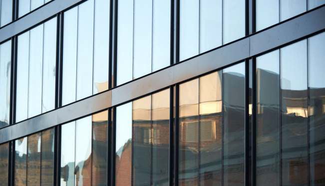Curtain Wall Glazing - Stick or Unitized system?